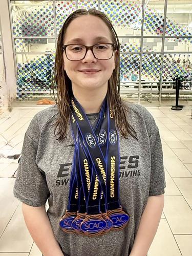 Naramore swimming strong at University of the Ozarks | Community ...