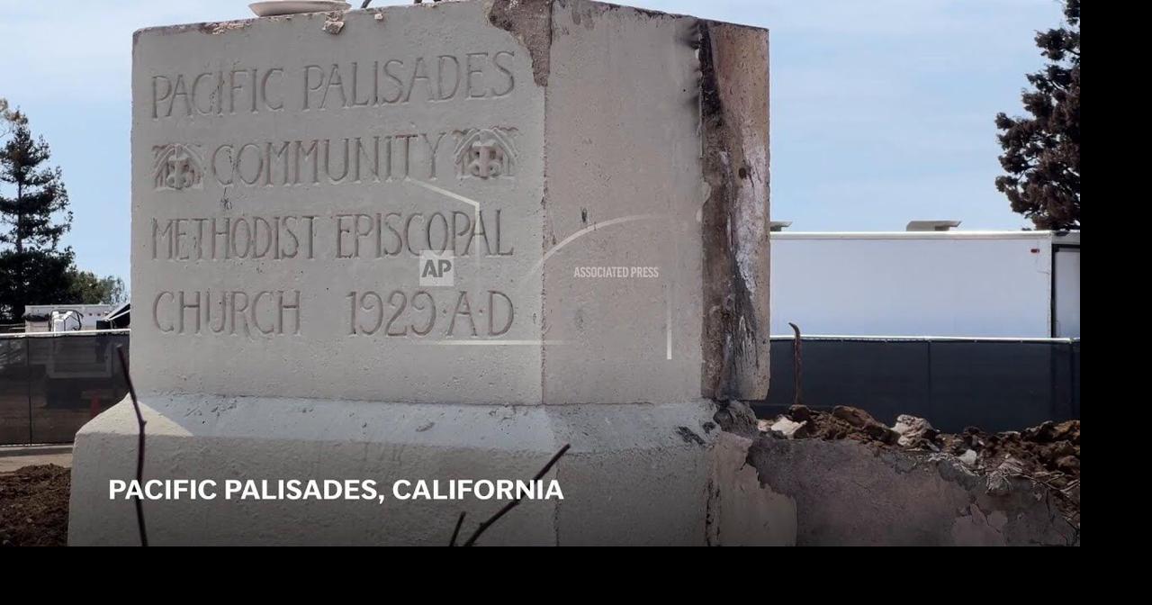 Members of burned LA church bear a cross through their devastated ...