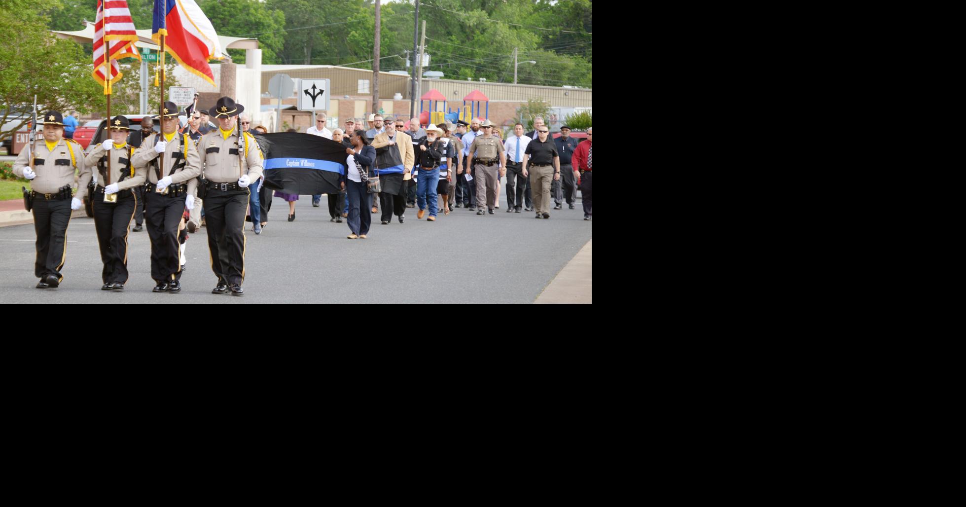 Solemn salute: Local law enforcement, family, friends gather to ...