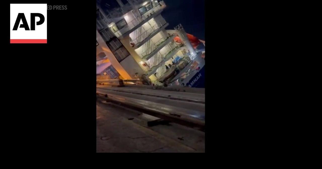 Container ship spills cargo at Istanbul port after tilting sideways ...