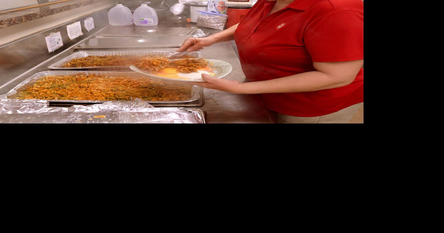 Salvation Army handing out food boxes, serving community meal ...