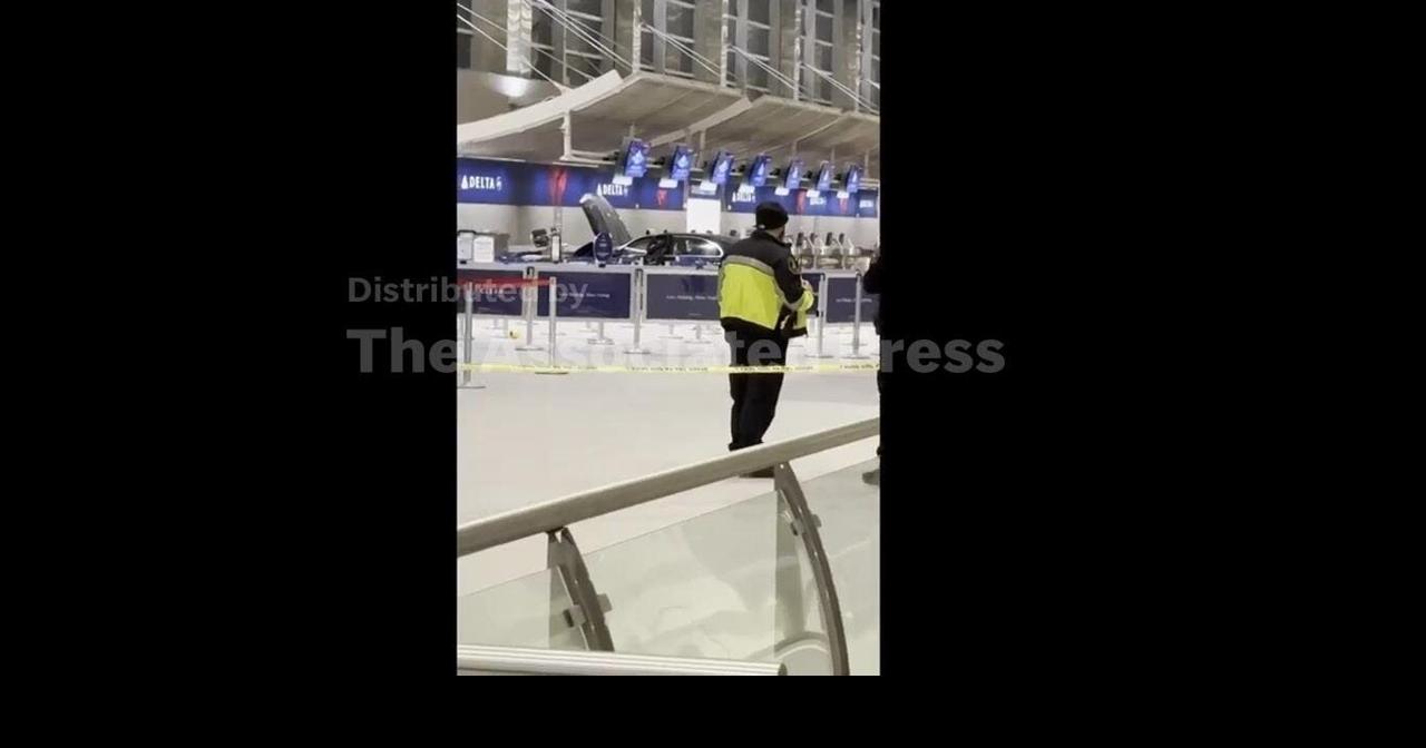 Car crashes into Detroit-area airport entrance, injuring 6 | Ap Video ...