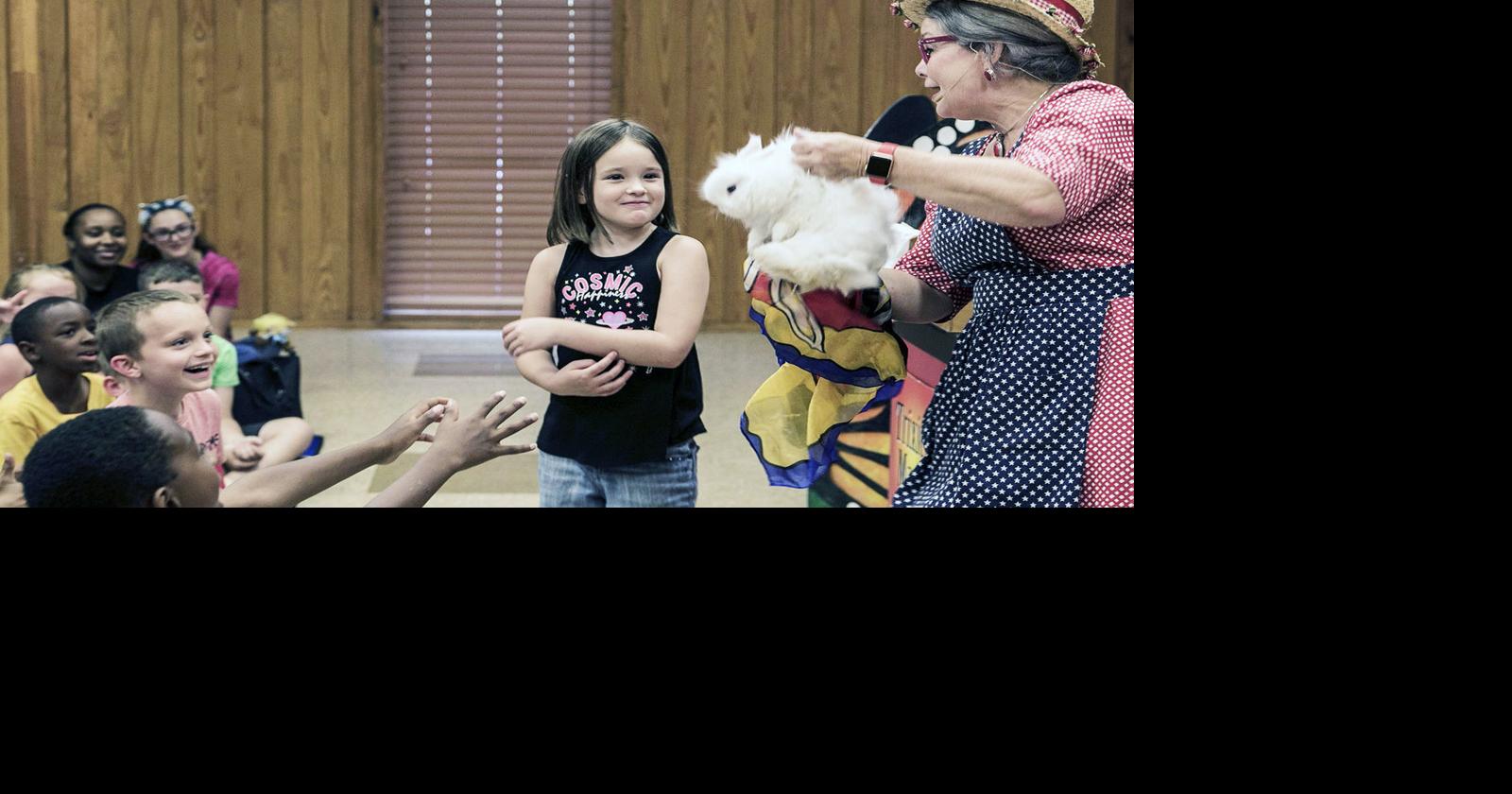 Magician Trixie Bond charms audience at T.L.L. Temple Memorial Library ...