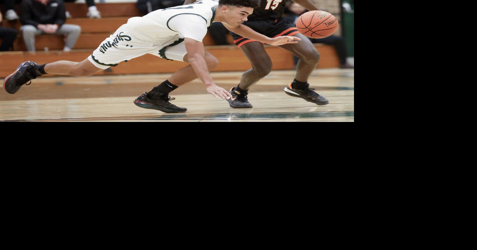 High school boys basketball: Madison lockdown defenders