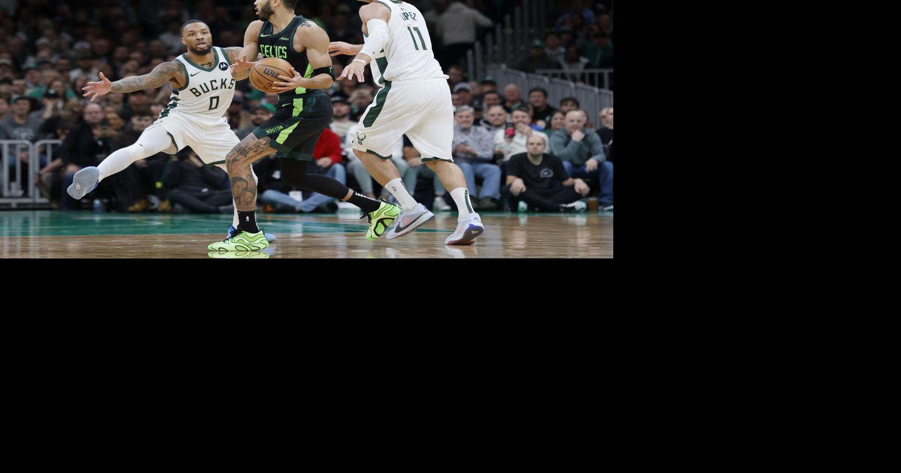 Bucks' Middleton return spoiled by Tatum, Celtics