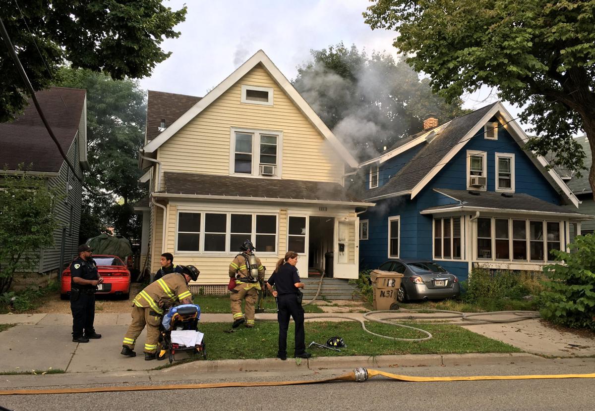 Workers credited with saving man from fire on Madison's East Side