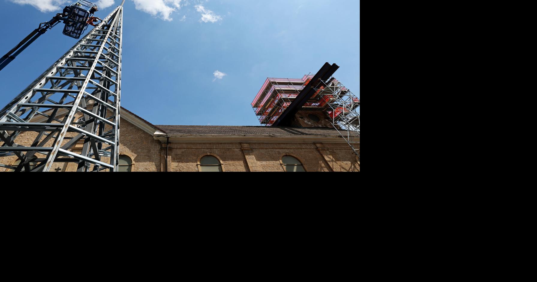 Steeple is being built at Holy Redeemer Catholic Church in downtown Madison