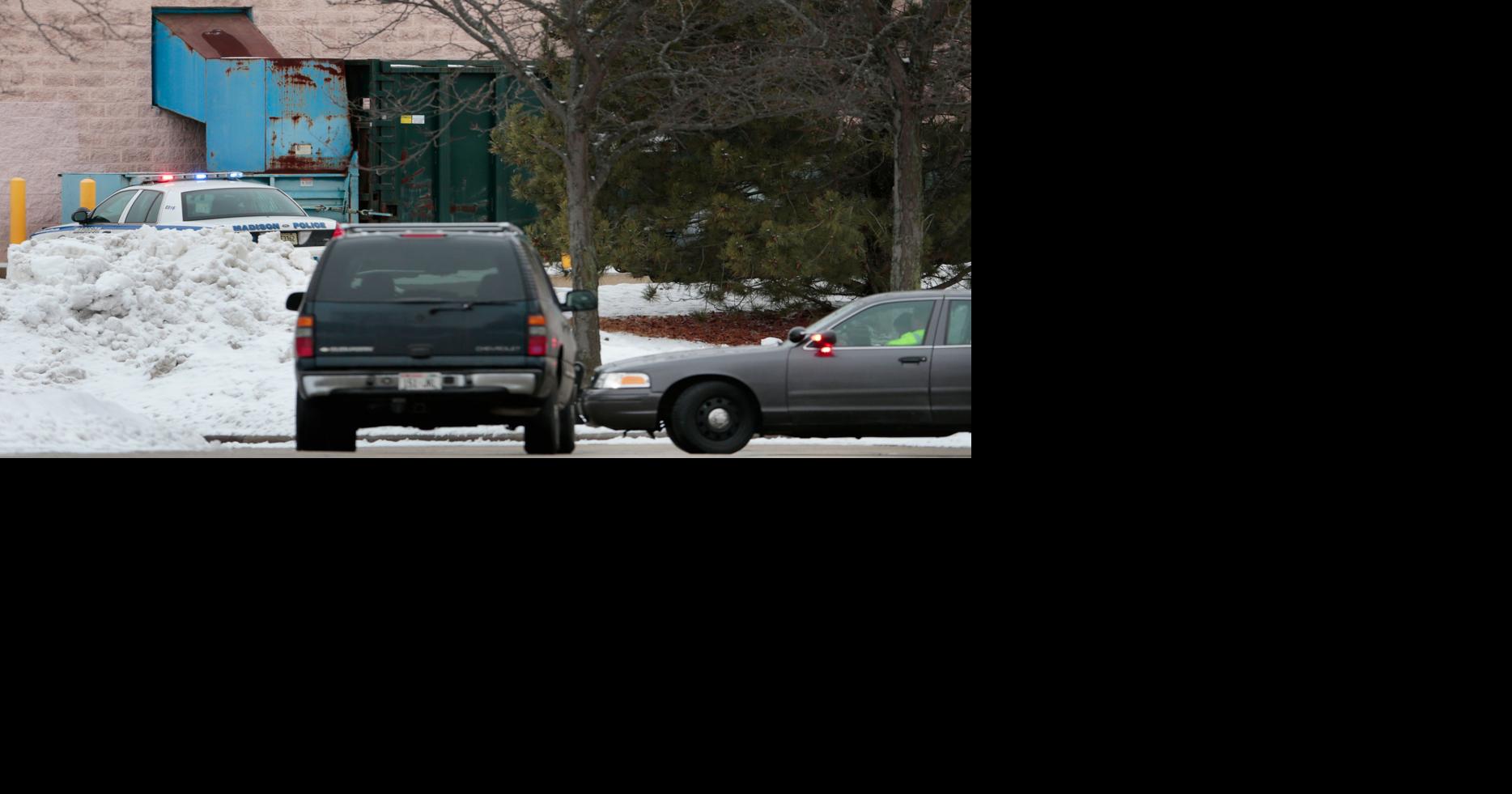 Homicide suspect arrested in dumpster after trading shots with police