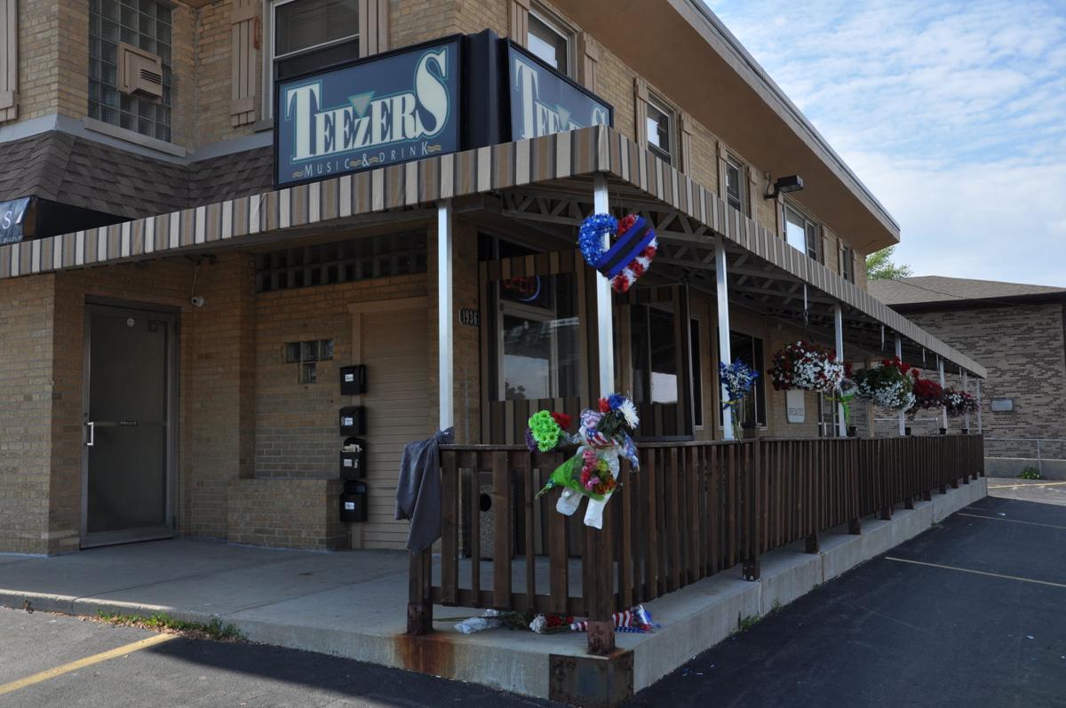 Racine in shock after police officer shot and killed intervening in ...