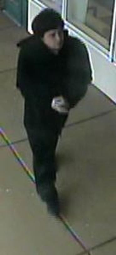 Image of wig-wearing bank robber released by Madison police