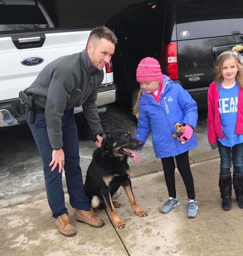 More than 30 Wisconsin K-9 units visit terminally ill Hartland girl who ...