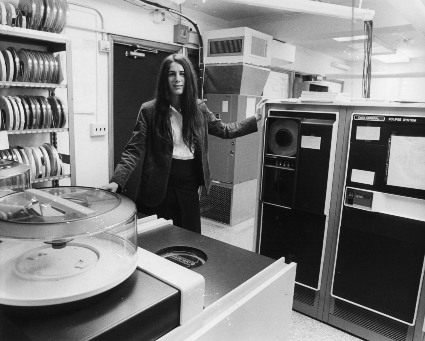 Judy Faulkner poses next to a Data General minicomputer in 1982 at the ...