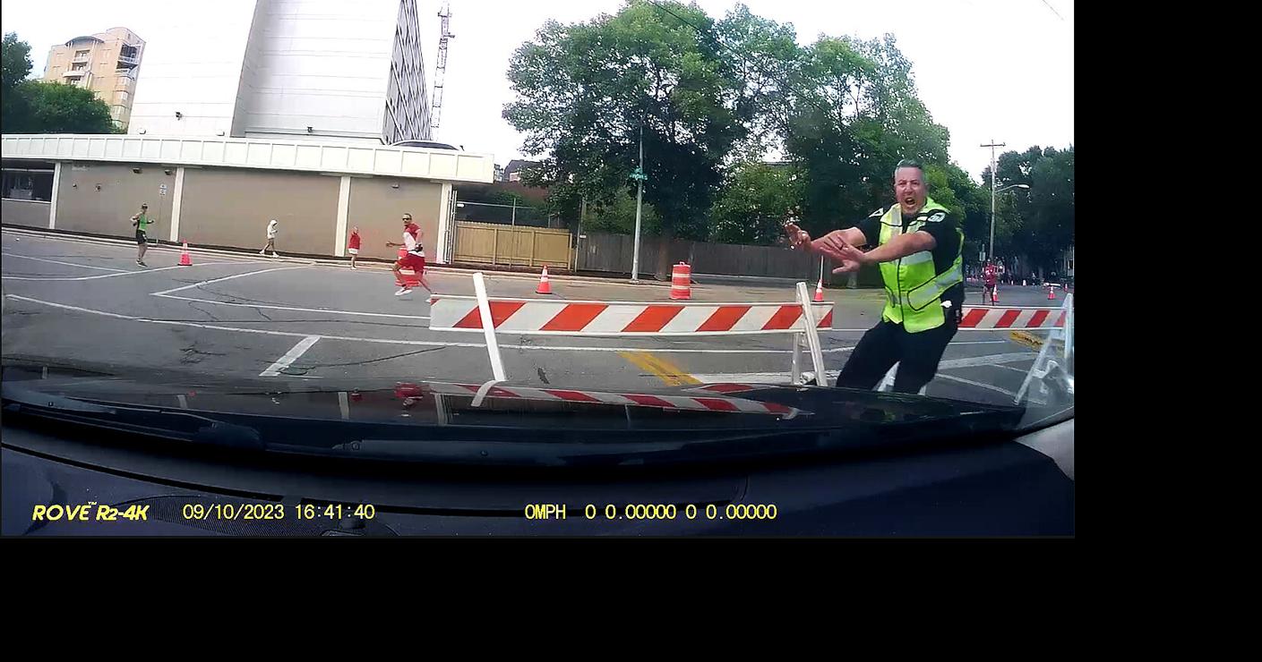 Driver hits barricades, nearly hits Ironman athletes