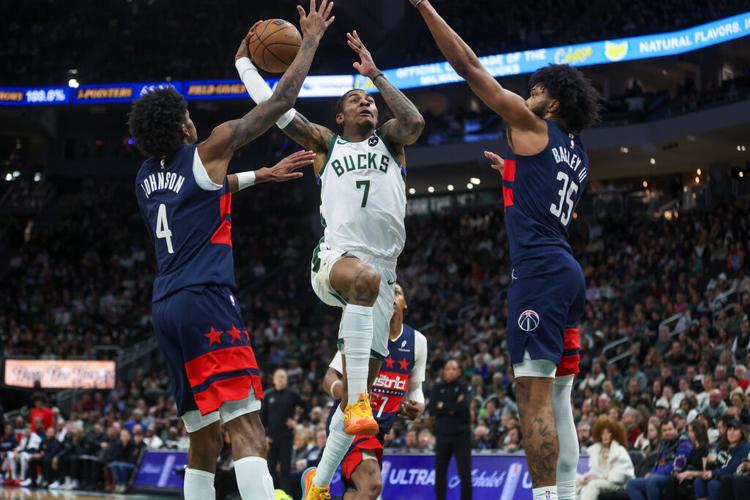 Bucks lose to Wizards on buzzer beater by C.J. McCollum