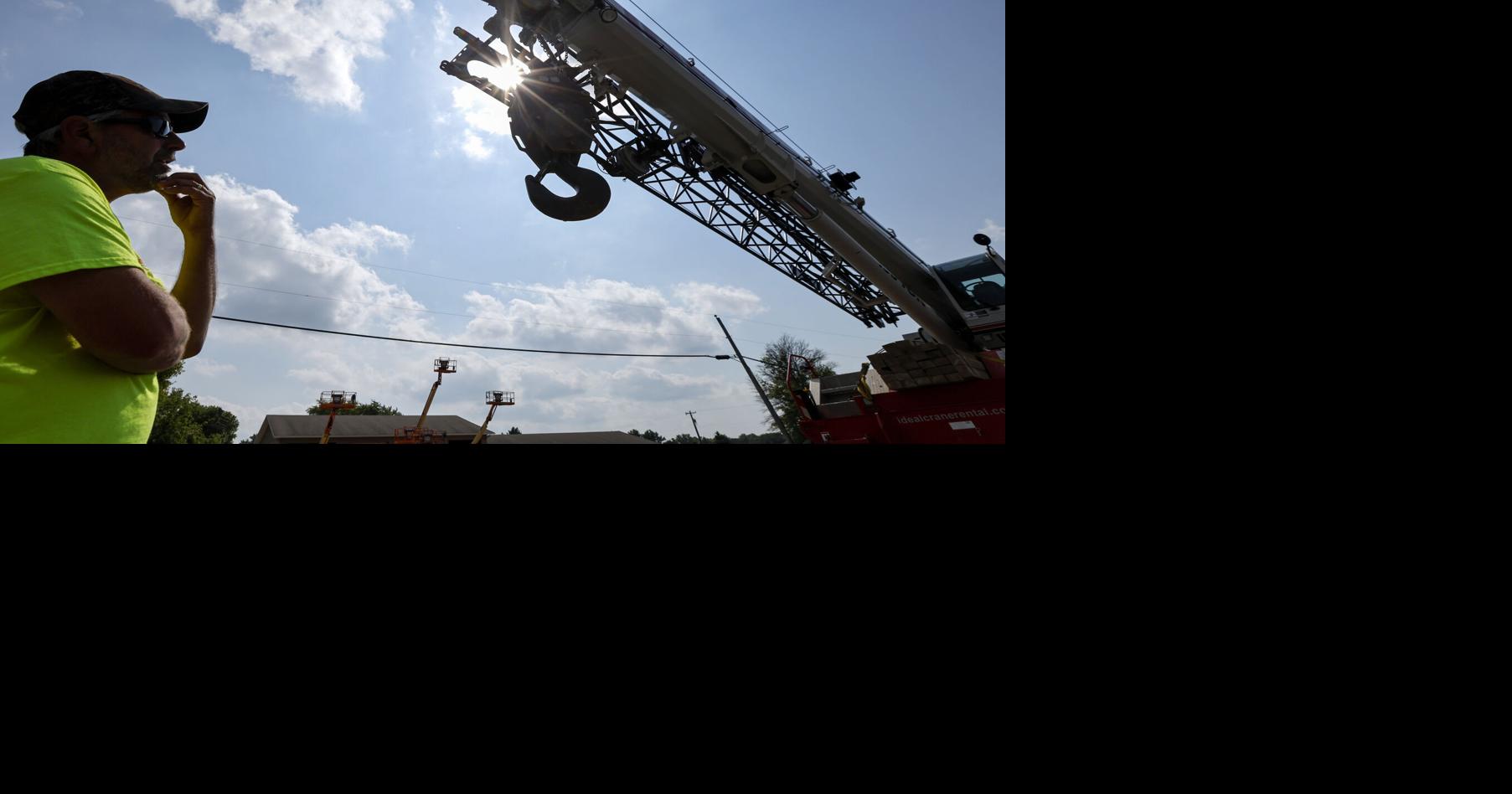 Crane operator Scott Sands does the heavy lifting