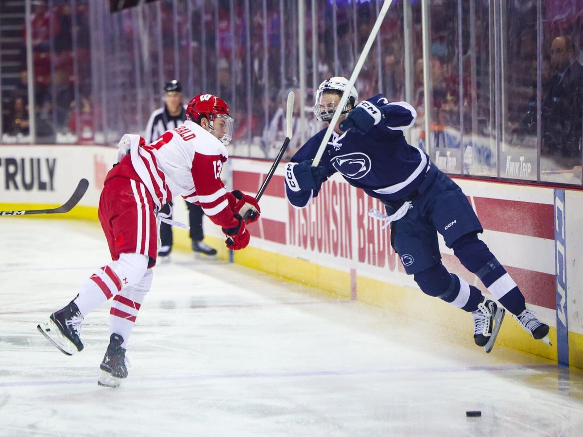 Why didn't Wisconsin men's hockey coach shake hands?