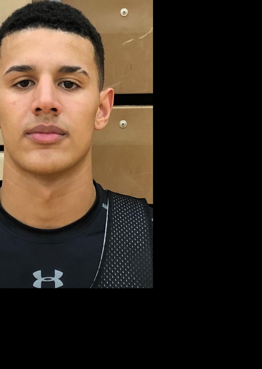 With Greg Gard watching, Johnny Davis pours in 31 points to key another ...