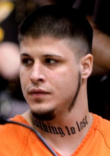 Man charged in two killings erupts in court outburst