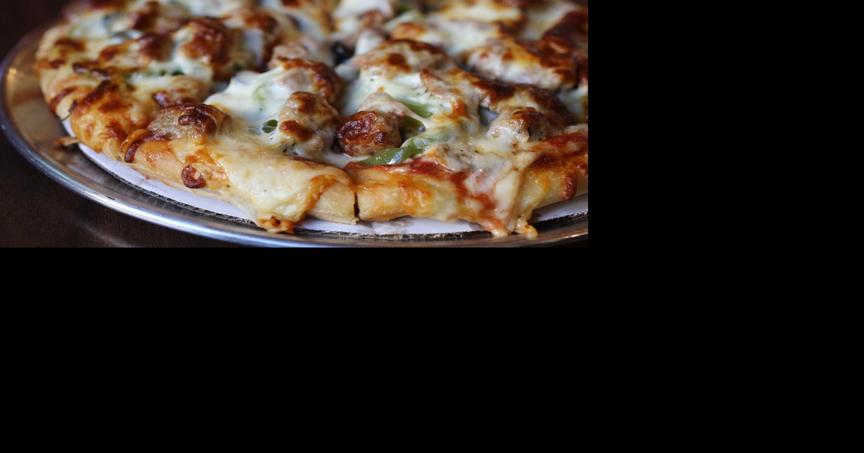 Restaurant review: Marcine's goes over the top with heavy-duty pizzas