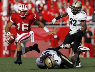 Wilson vs. Purdue: 15 of 20 for 205 yards, 2 TDs; 10 carries, 76 yards ...