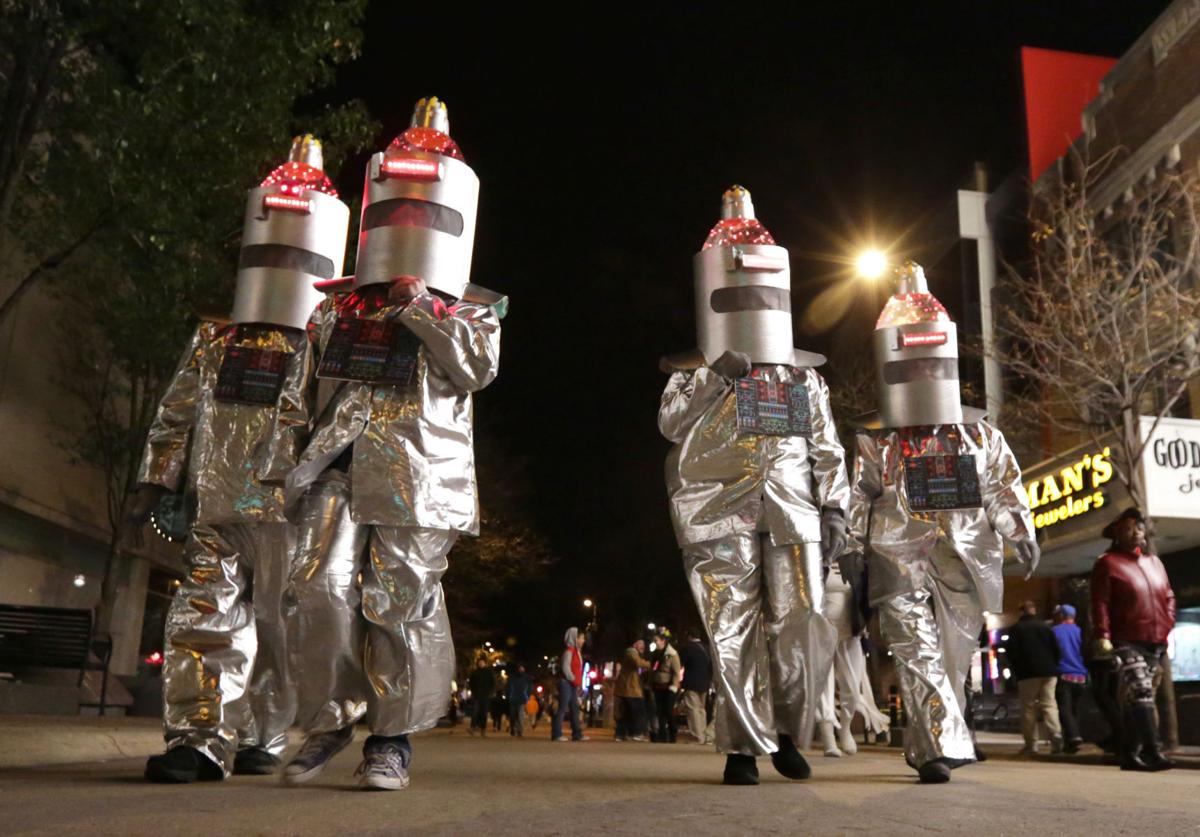 Despite chilly weather, thousands converge on State Street for ...