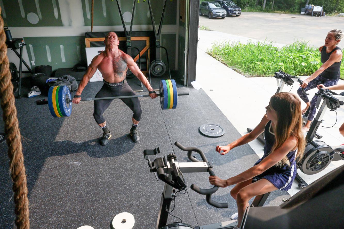 CrossFit athlete Roman Khrennikov gets help from Madison