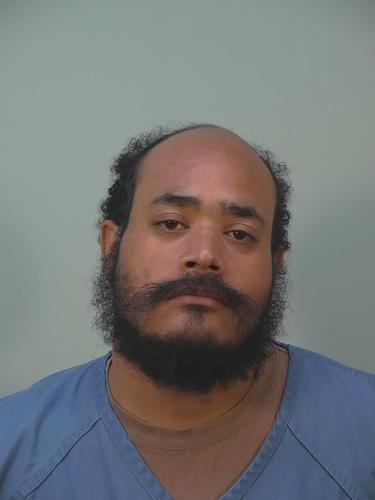 Panhandler arrested after pulling knife on man outside North Side store ...