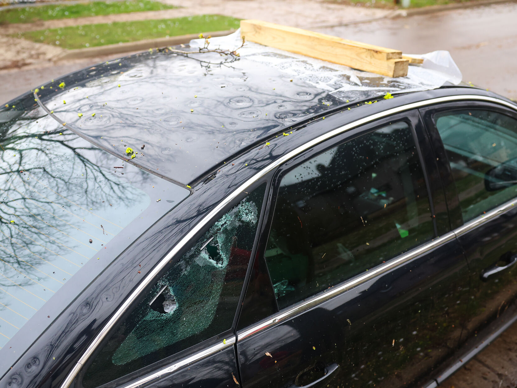 2-inch hail damages car windows, library in Wisconsin town