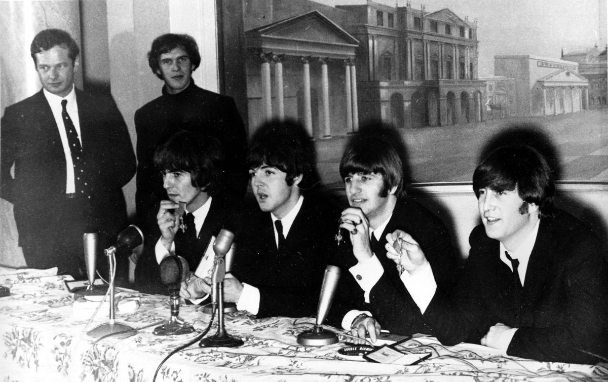 Anniversary gallery: The Beatles receive MBE medals from queen