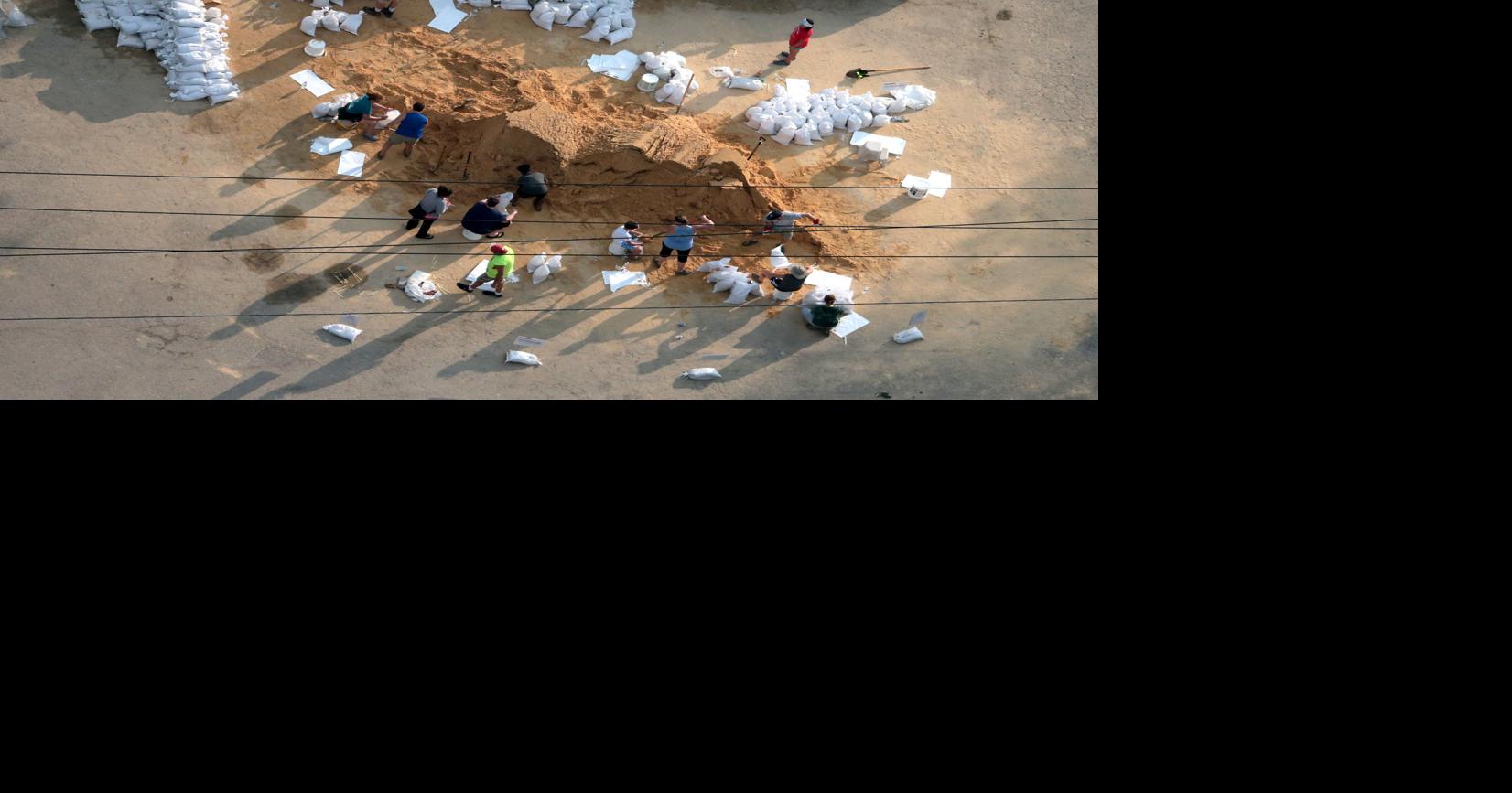 Photos: Views of flooding, sandbagging from the air and ground Saturday