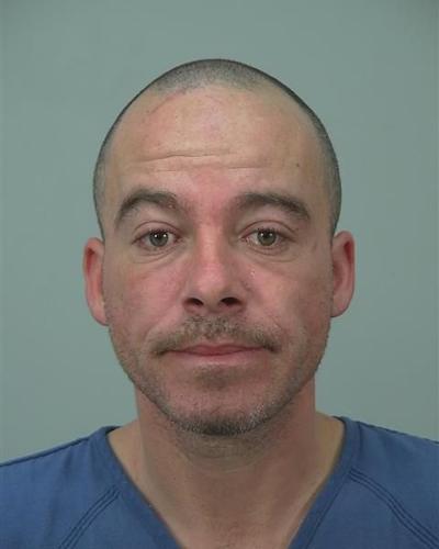 Pointing rifle at others leads to arrest, Madison police say