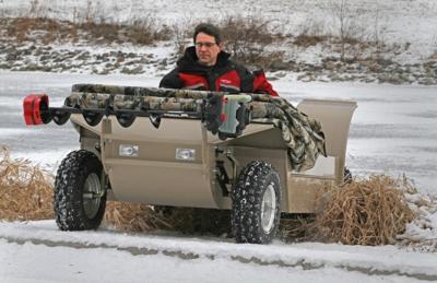 Outdoors: Vehicle for ice fishing navigates land, ice — and water