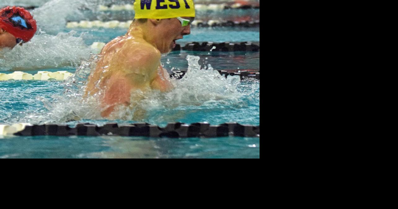Madison West's Abram Mueller wasn't expecting to shatter Division 1 breaststroke state record