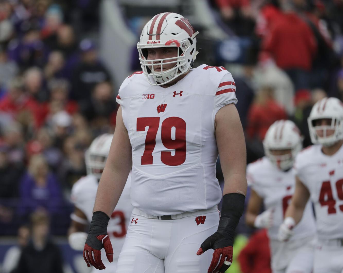 Wisconsin adds 3 more assistant football coaches