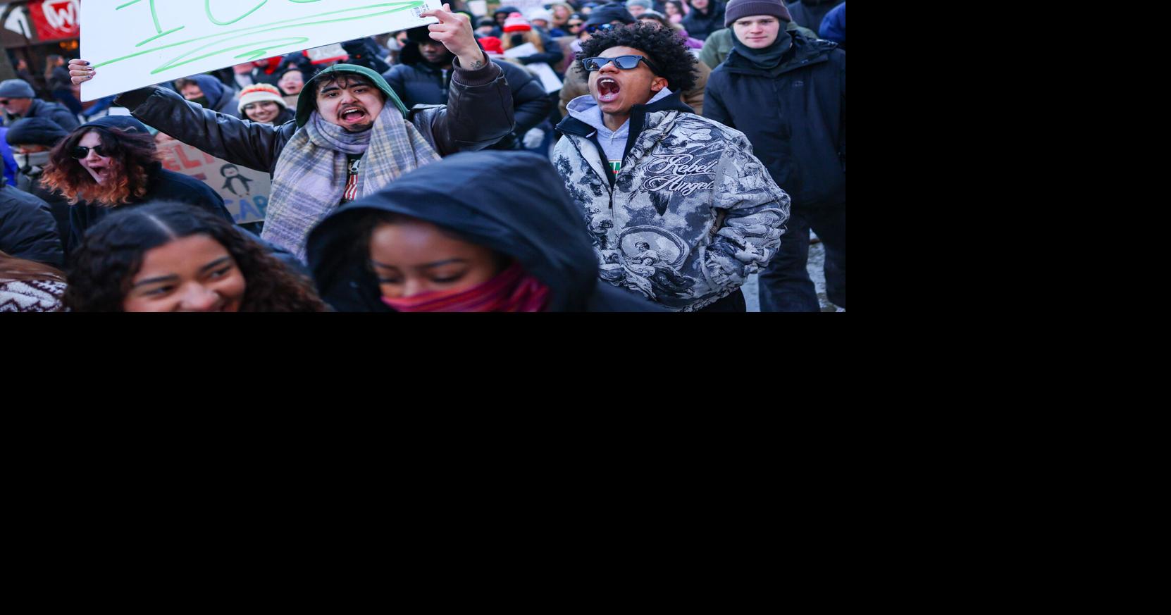 Photos: Hundreds gather for walkout and rally against ICE