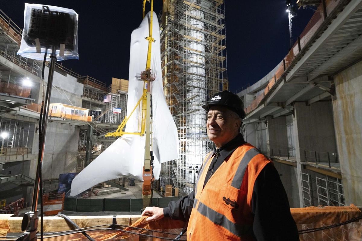 Space Shuttle Endeavour Hoisted For Display In Launch Configuration At