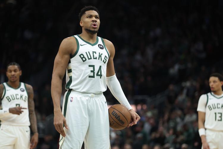 Bucks lose to Wizards on buzzer beater by C.J. McCollum