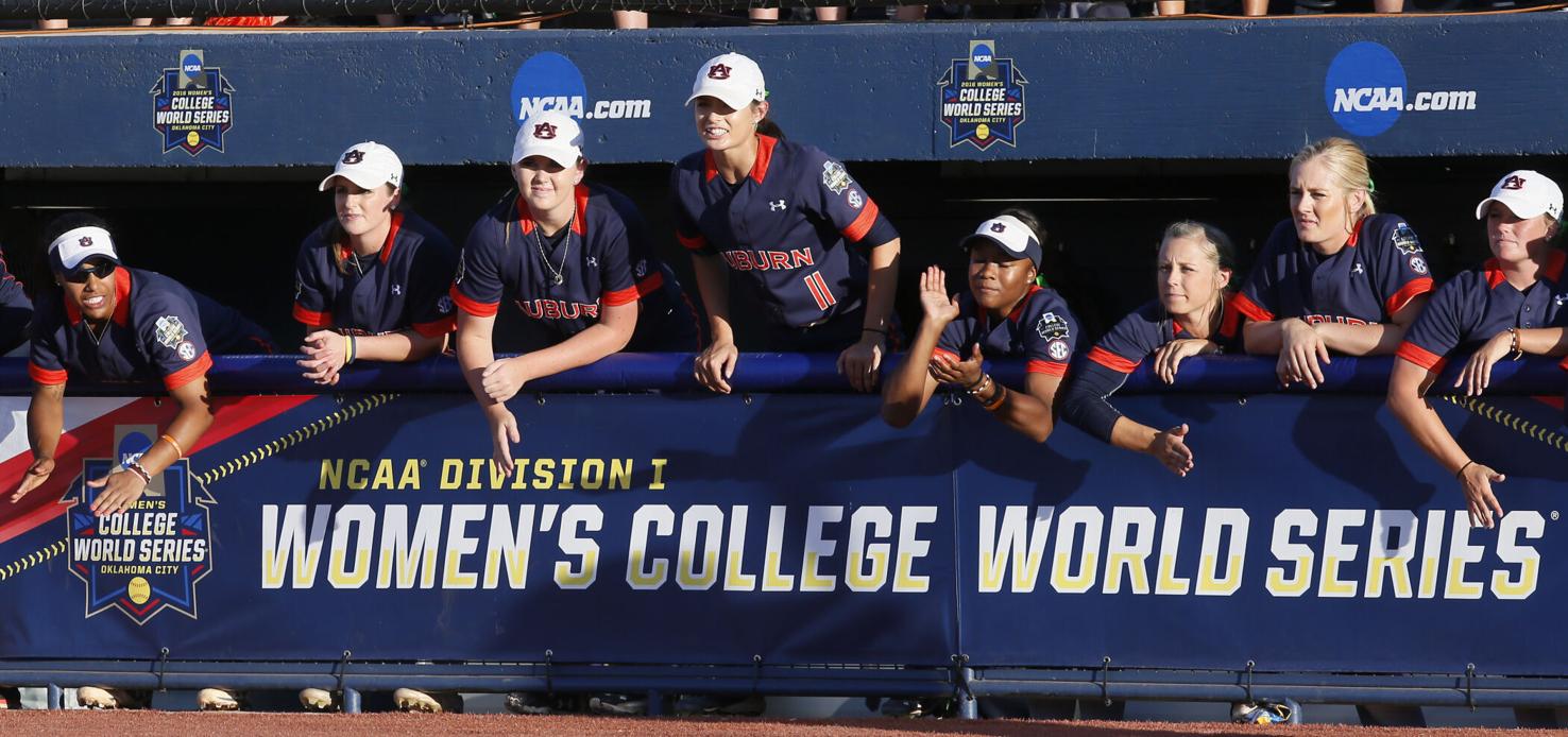 College softball players bring cheers, chants to dugout