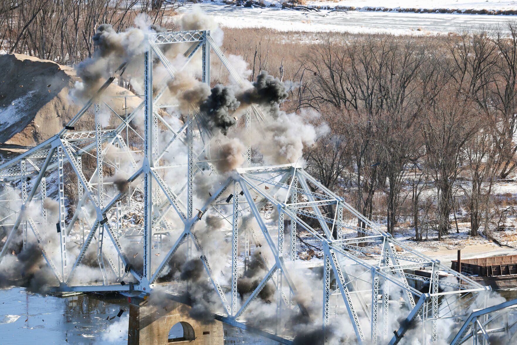 See the moment the Black Hawk Bridge drops into the river