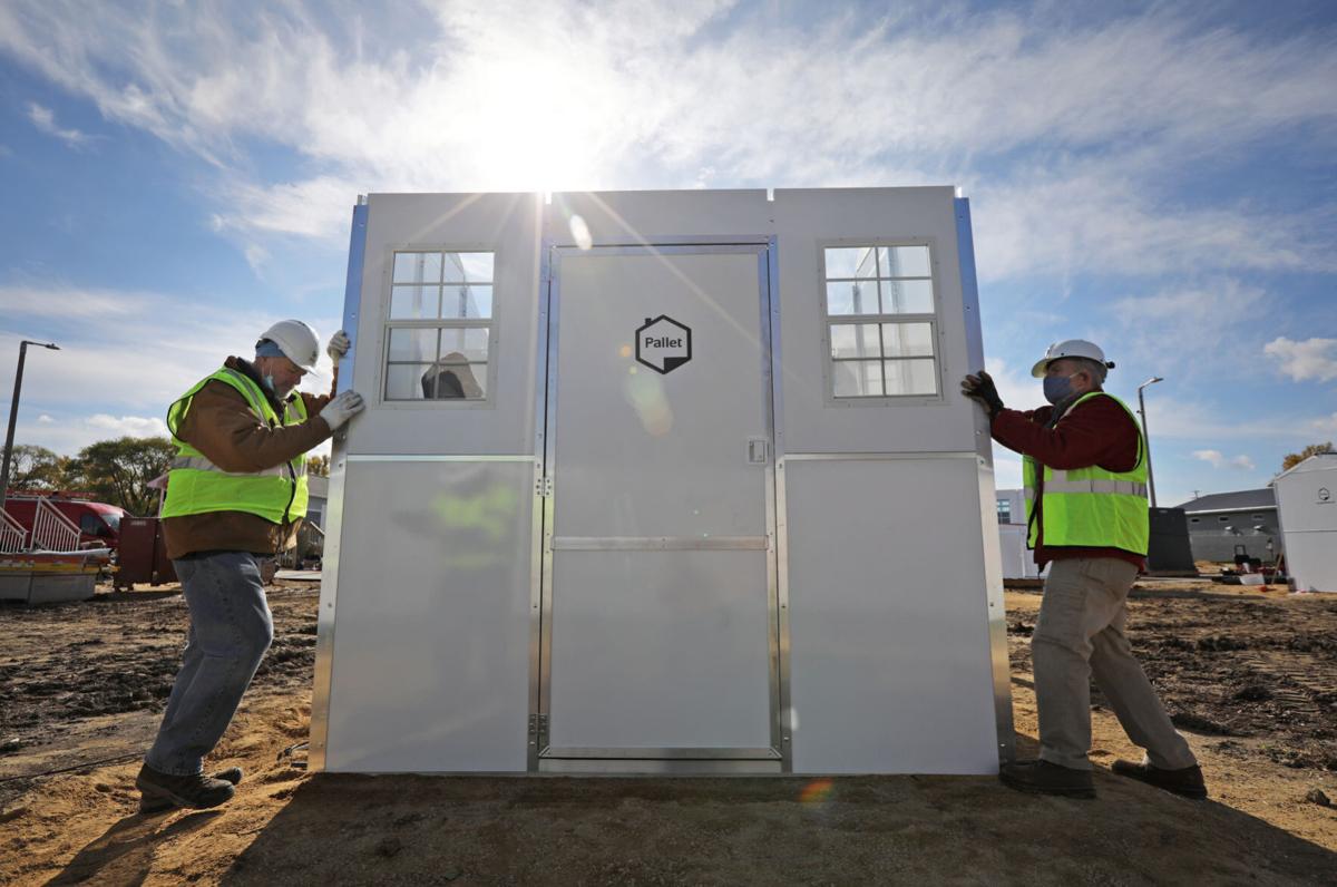 Photos: Tiny shelters are constructed at the city's first sanctioned ...