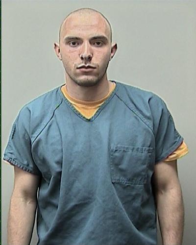 Former student charged with possessing homemade explosive