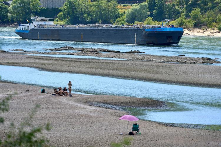 France restricts public alcohol consumption and outdoor sports as heat ...
