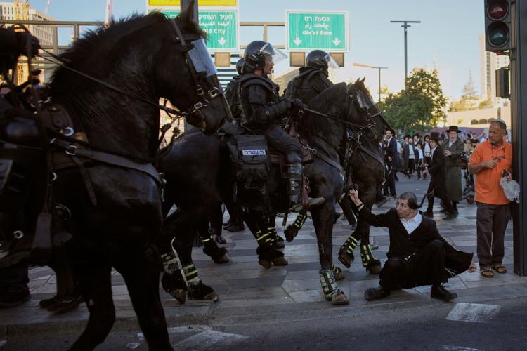 Ultra-Orthodox protesters block roads and trains across Israel over ...