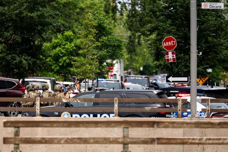 Gunman kills a Montreal officer at a Hilton hotel before being shot ...