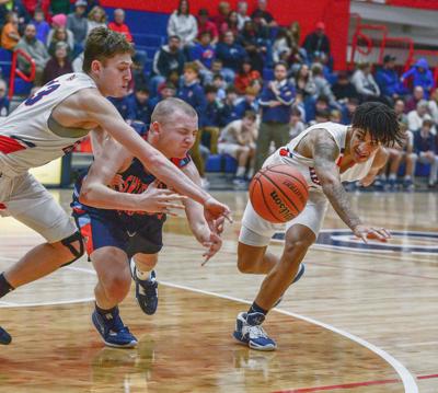 BOYS BASKETBALL ROUNDUP: No. 9 Rebels roll over Switzerland 62-48 to ...