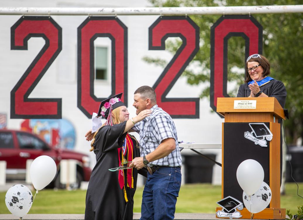 PHOTOS: Six graduates receive their diplomas at Richfield High School.