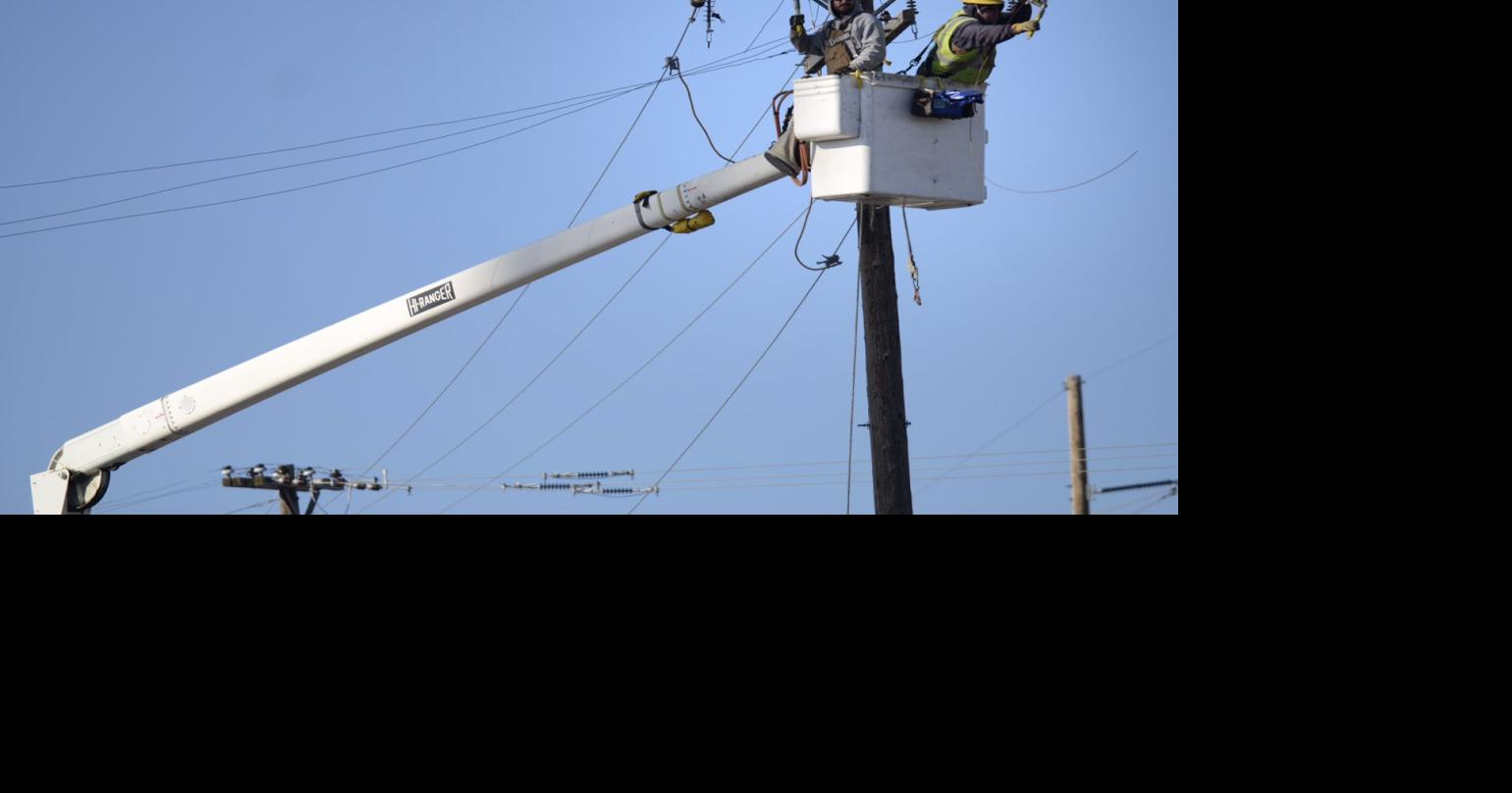 Truck Hits Power Lines at Washington and Orchard
