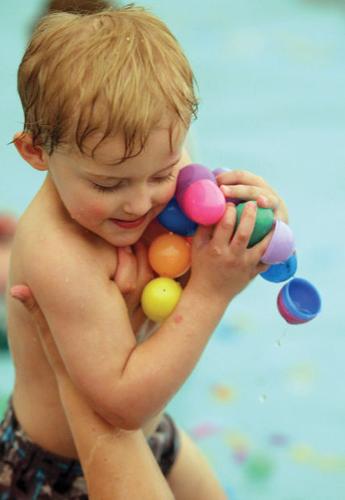 YMCA Easter Egg Dive Draws Hundreds to City Pool