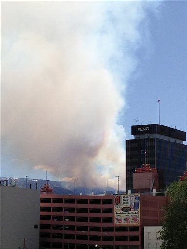 Reno Wildfire 95% Contained; More Rain, Hail Helps
