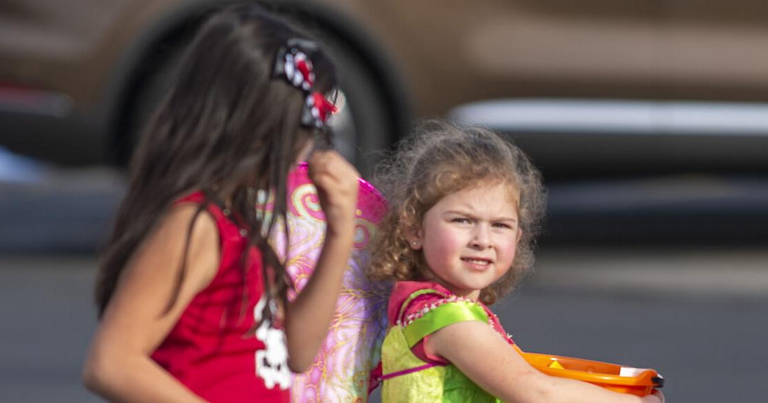 Trick-or-treaters bring home the candy